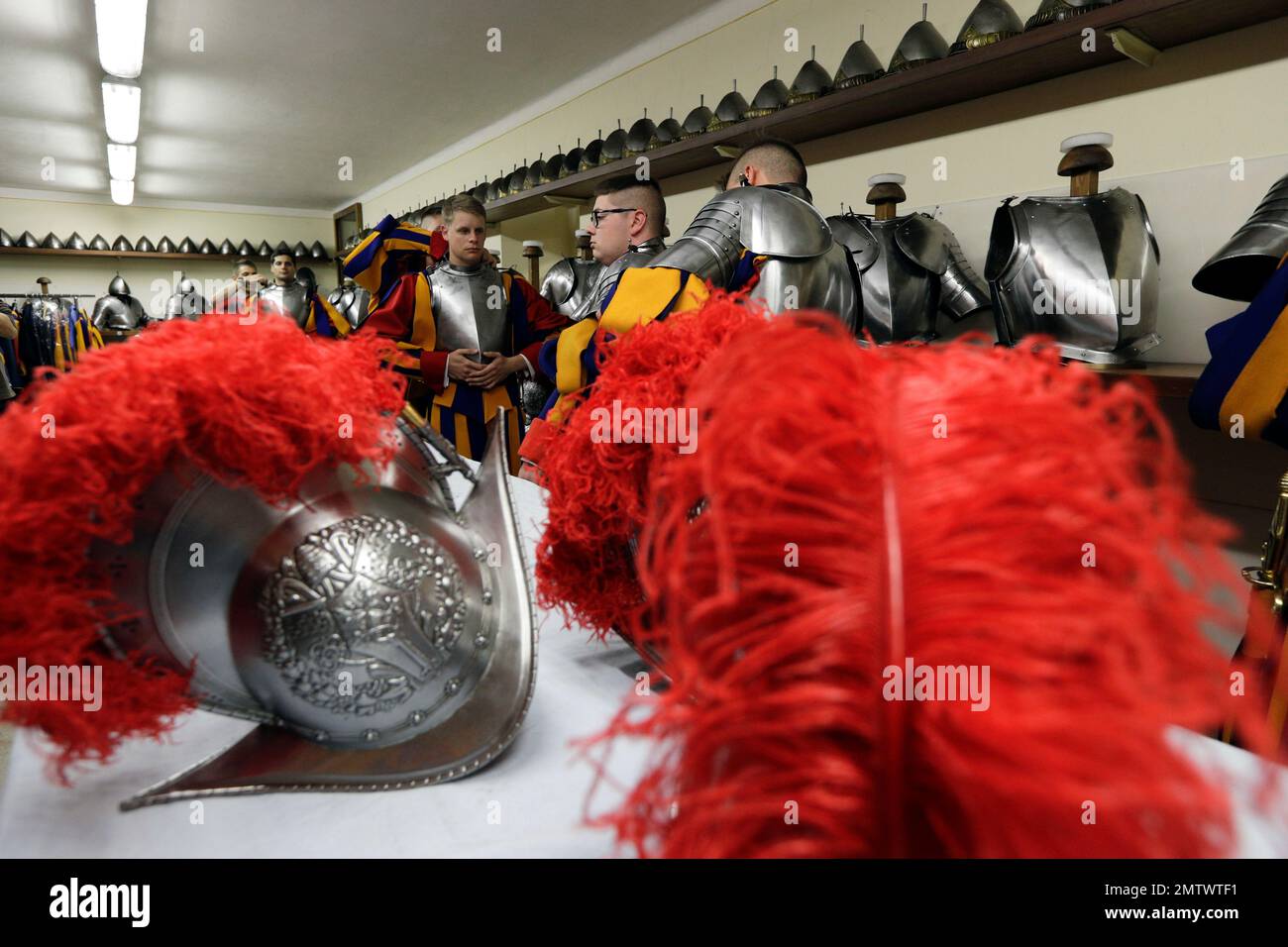 New Vatican Swiss Guards wear their uniforms and armors prior to a ...