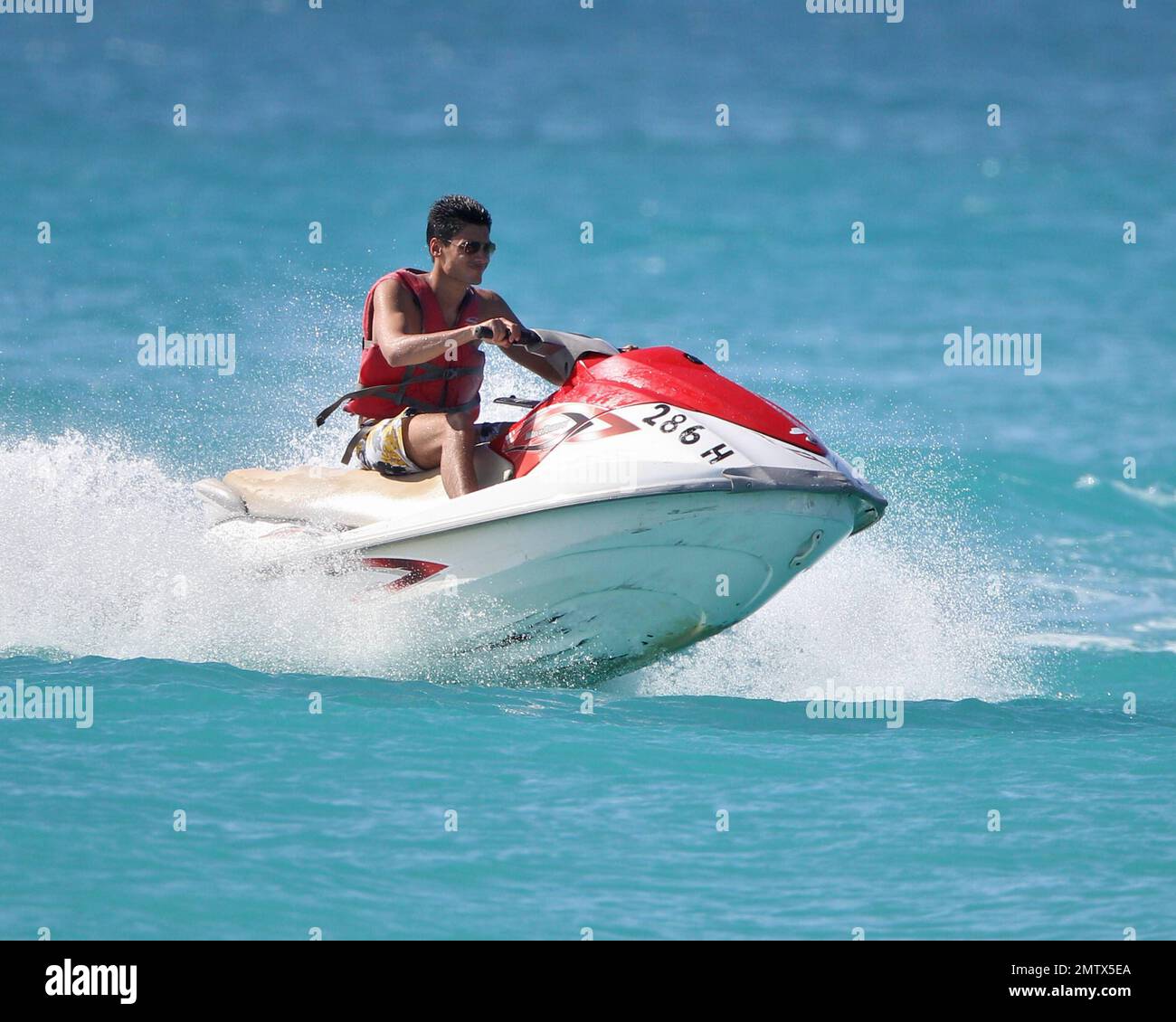 UK boyband The Wanted enjoy the sun and surf during a day of jetskiing ...