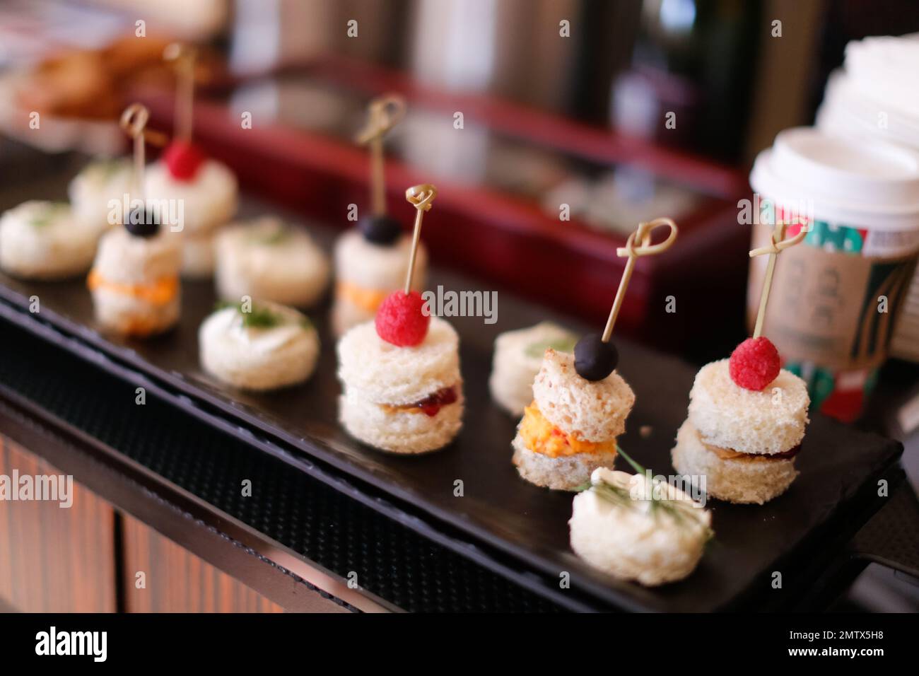 Appetizers - Tiny circular tea sandwiches Stock Photo - Alamy