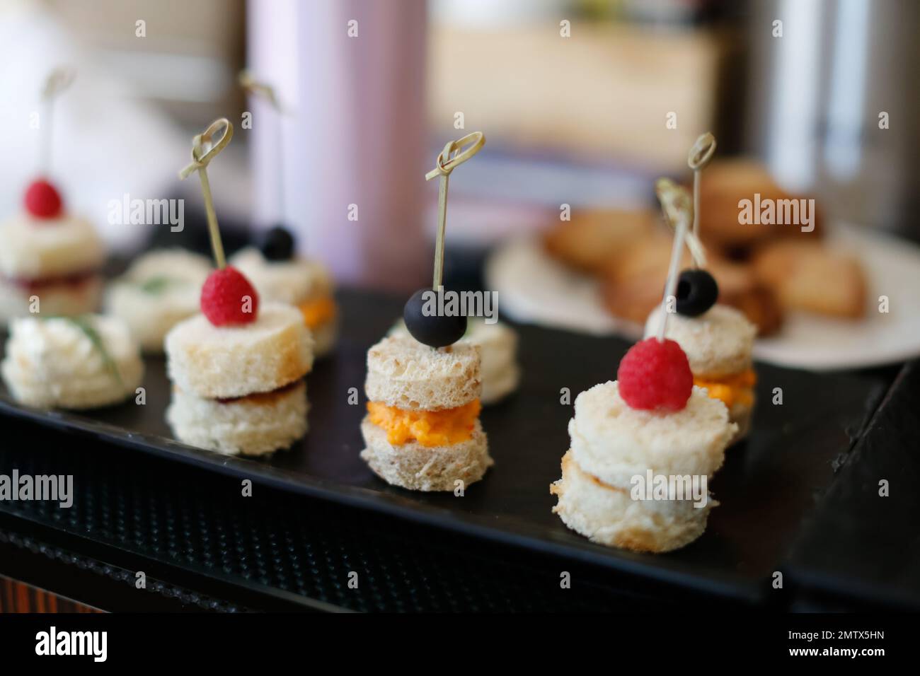 Appetizers - Tiny circular tea sandwiches Stock Photo - Alamy