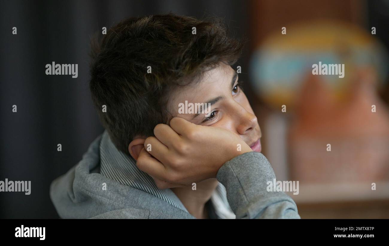 Thoughtful young boy one pensive kid thinking in contemplation Stock ...