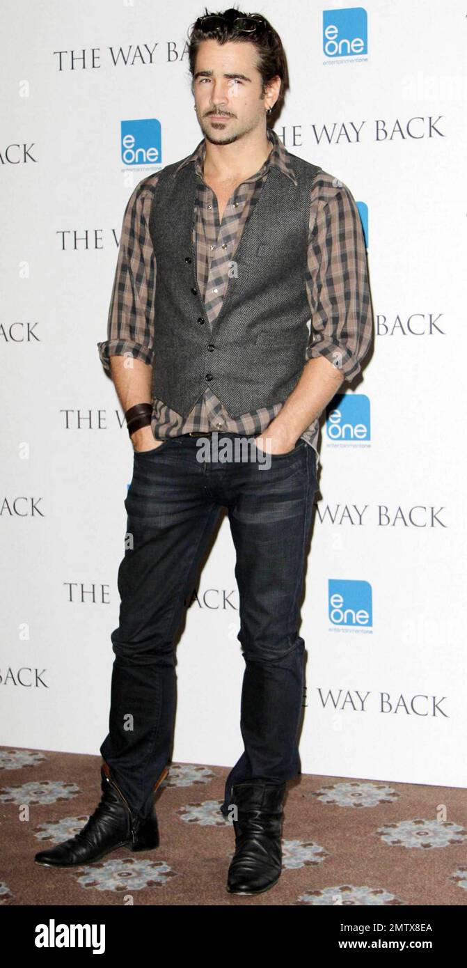 In a half-buttoned vest, plaid shirt and unzipped boots Colin Farrell ...