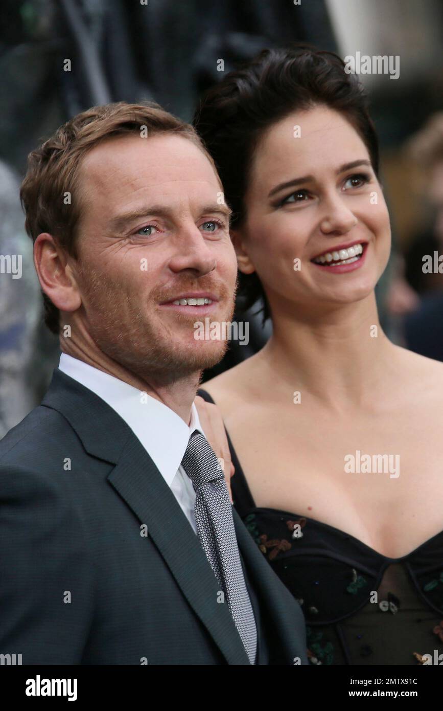 Actors Michael Fassbender, left, and Katherine Waterston pose for ...