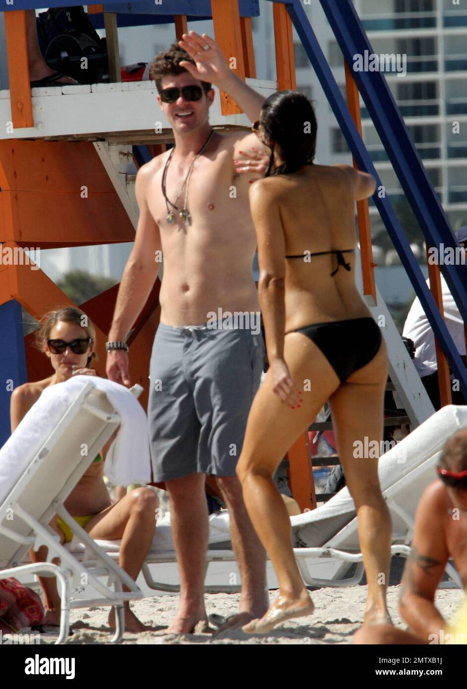 EXCLUSIVE!! Robin Thicke and his wife Paula Patton flaunt their perfect beach bodies during a ...
