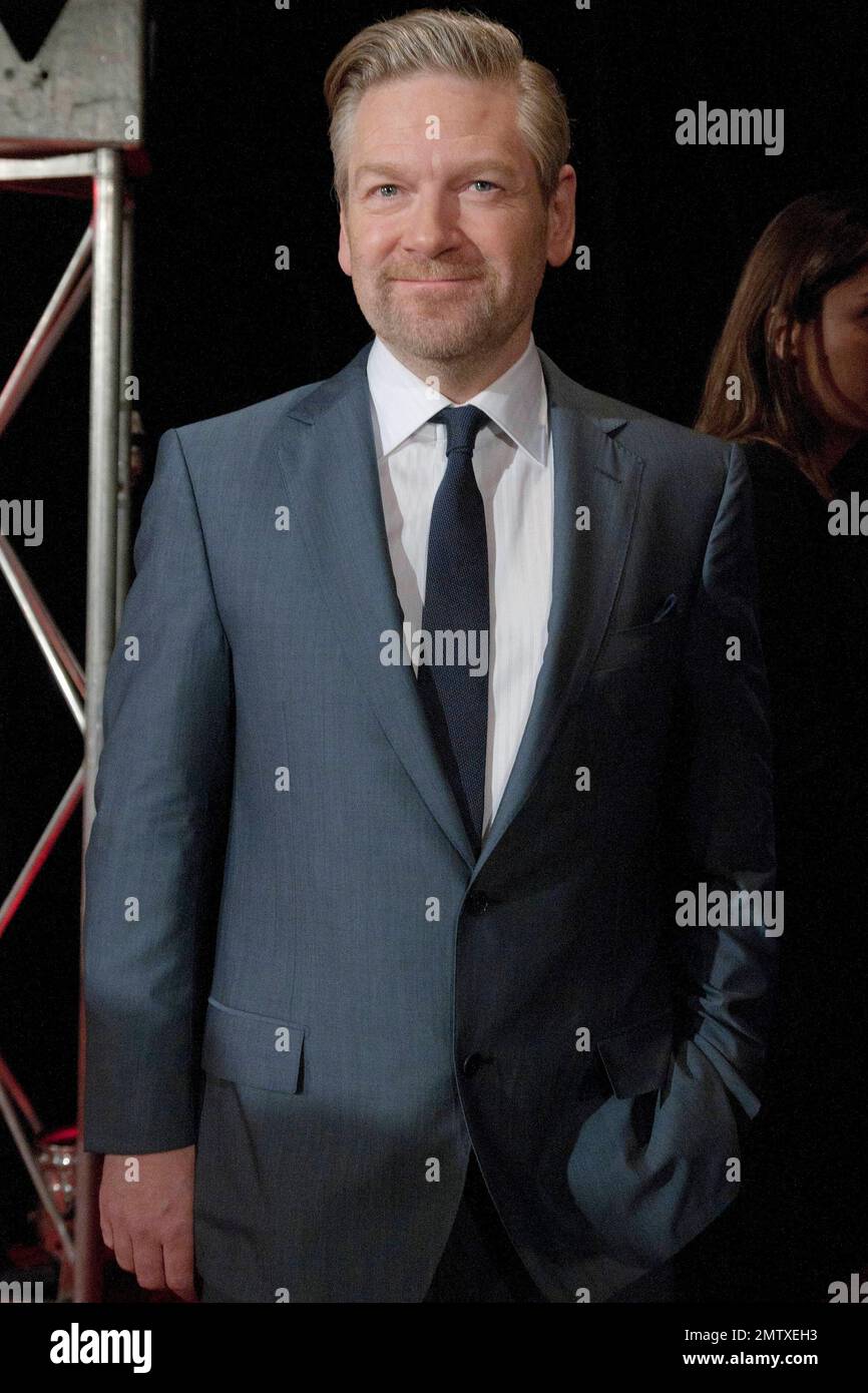 Kenneth Branagh poses for photographers at the world premiere of "Thor ...