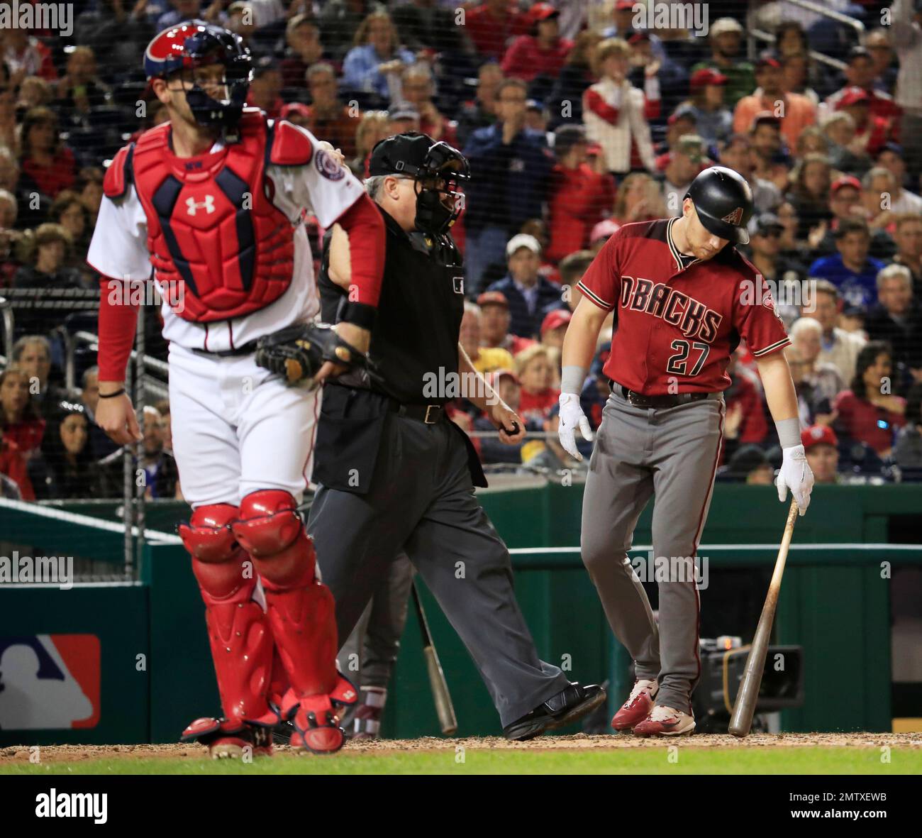 Washington Nationals catcher Matt Wieters (32) leaves the baseball ...