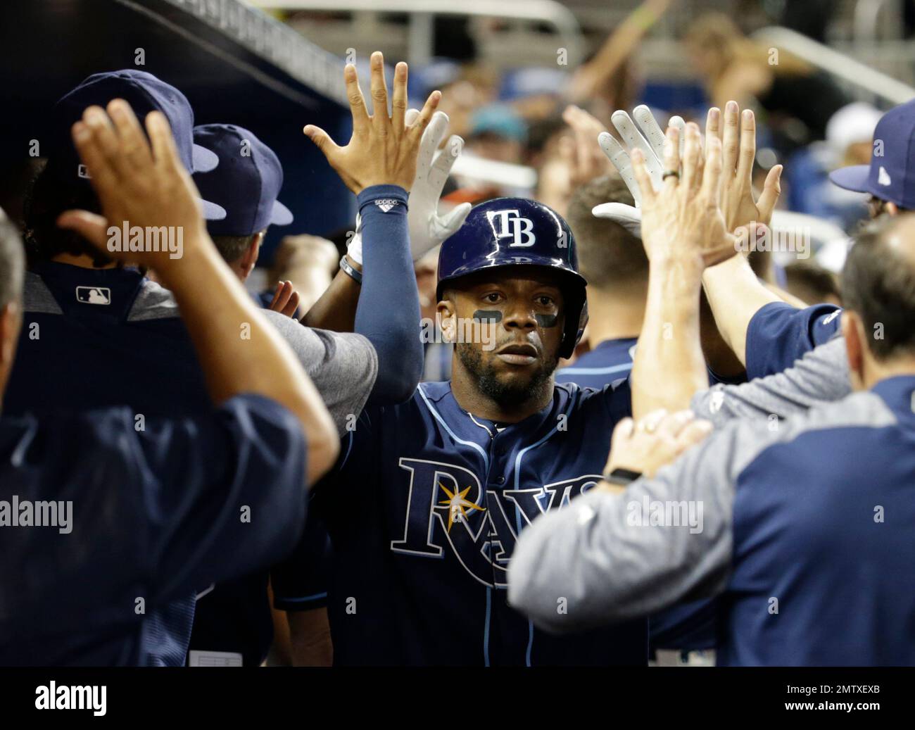 Tampa Bay Rays' Rickie Weeks is congratulated in the dugout after ...