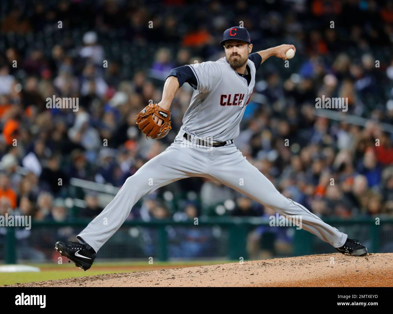 Cleveland Indians relief pitcher Andrew Miller throws to a Detroit ...