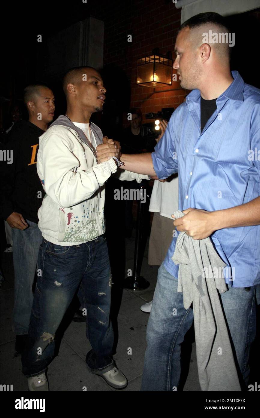 Rapper Ti leaves Mr. Chow and signs autographs and hugs a soldier on ...