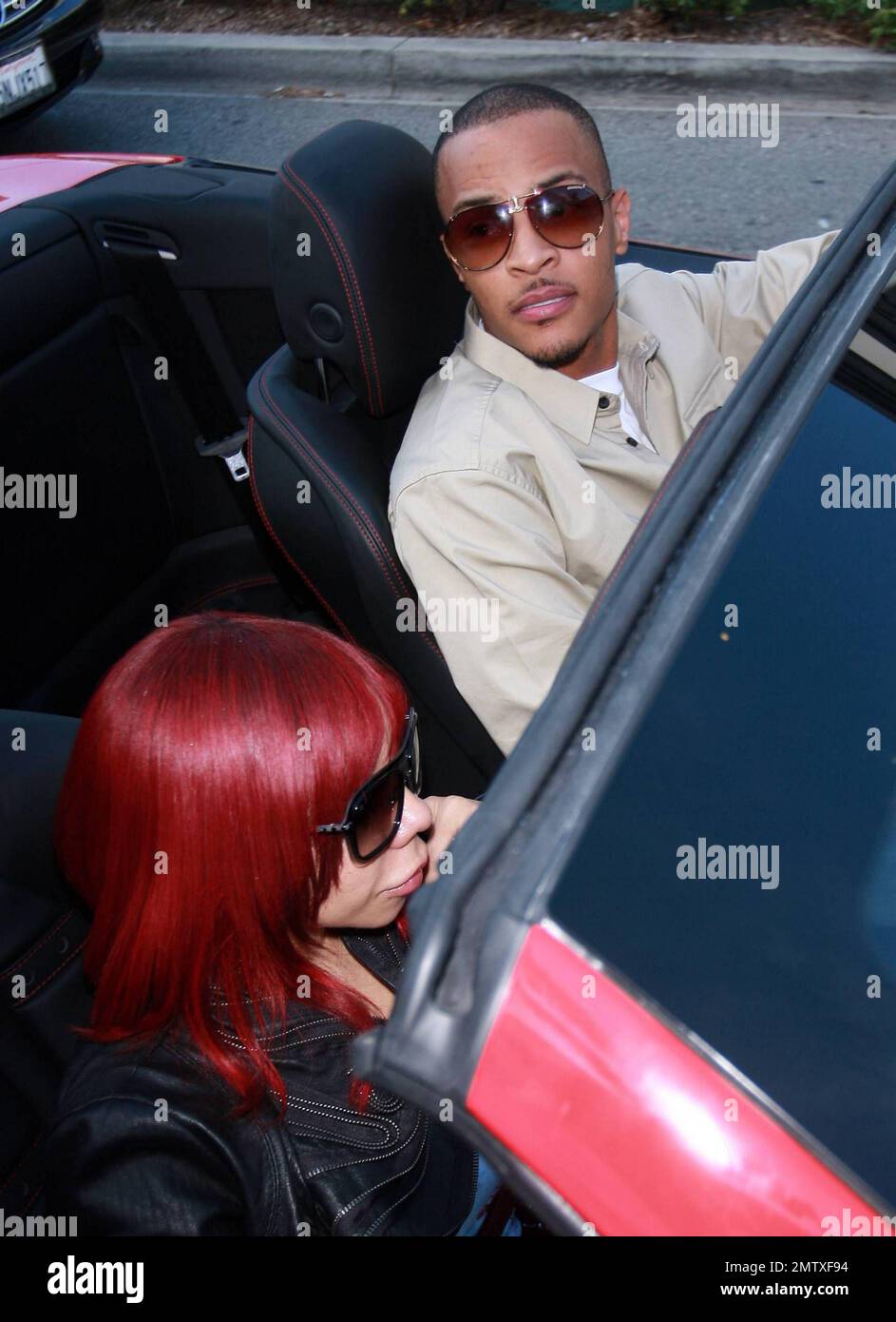 Rapper T.I. leaves the Louis Vuitton store after some shopping in ...