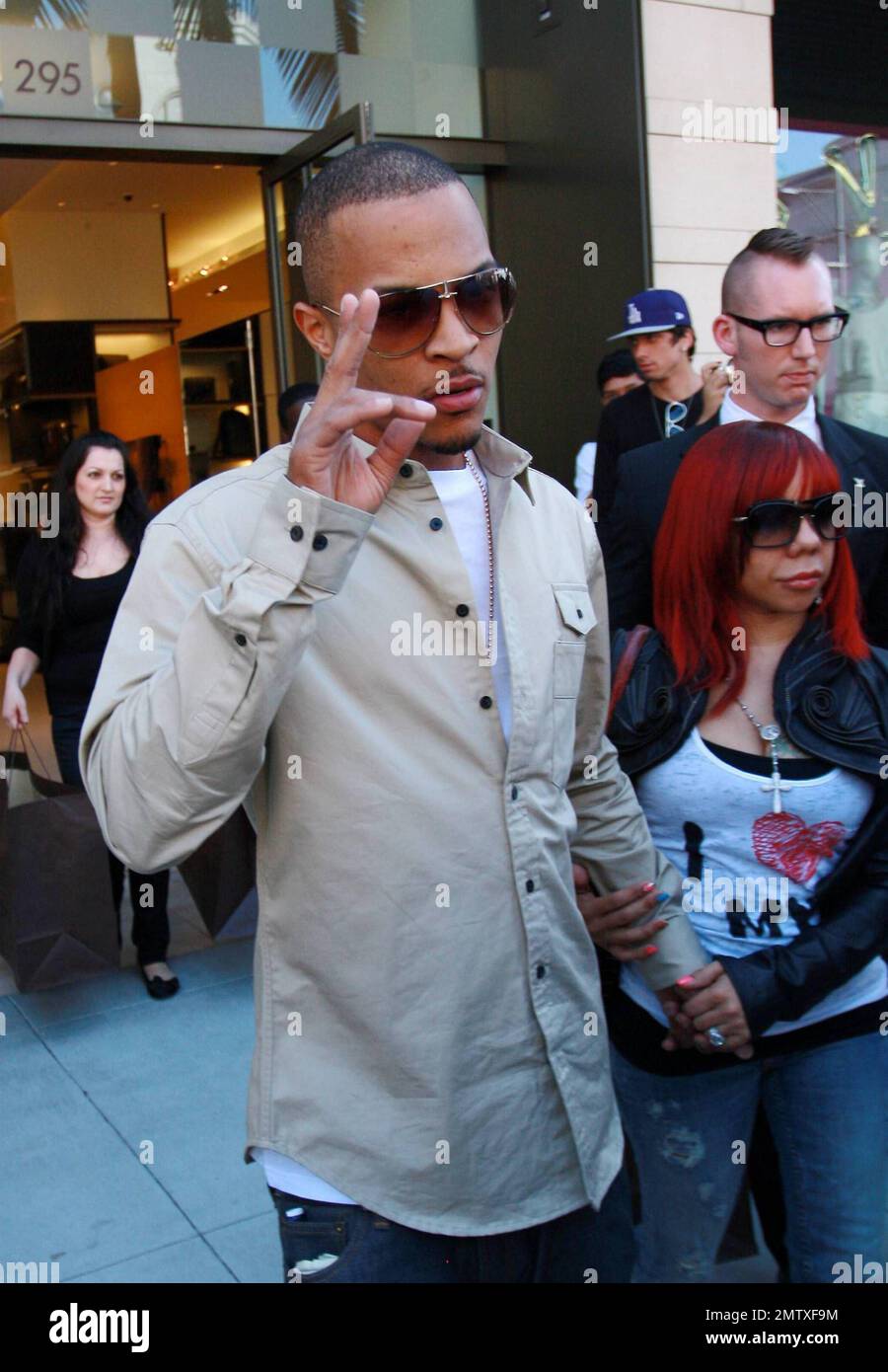 Rapper T.I. leaves the Louis Vuitton store after some shopping in ...