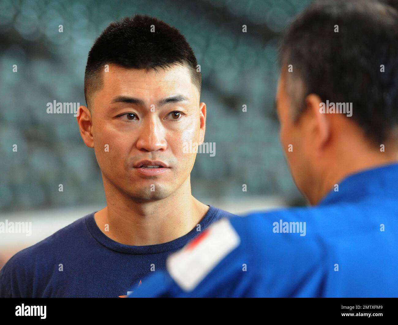 Houston Astros outfielder Niro Aoki, left, talks with astronaut Soichi ...