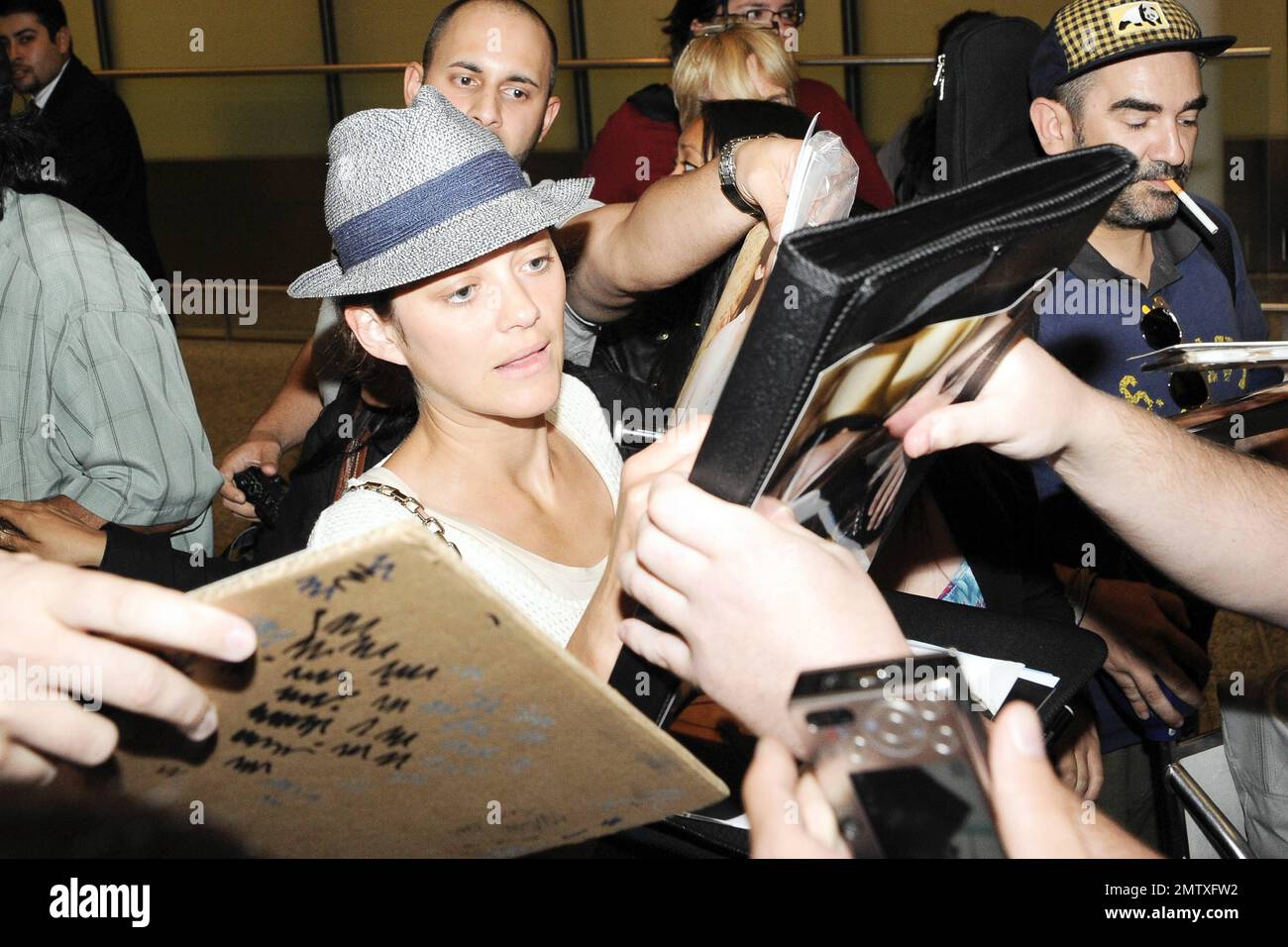 Marion Cotillard arrives at the Toronto International Airport in ...