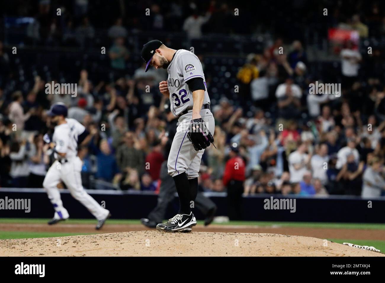 Colorado Rockies starting pitcher Tyler Chatwood (32) waits as San ...