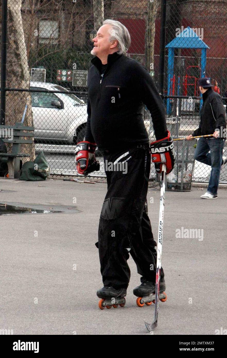 Actor Tim Robbins gets in a game of roller hockey with a group of ...