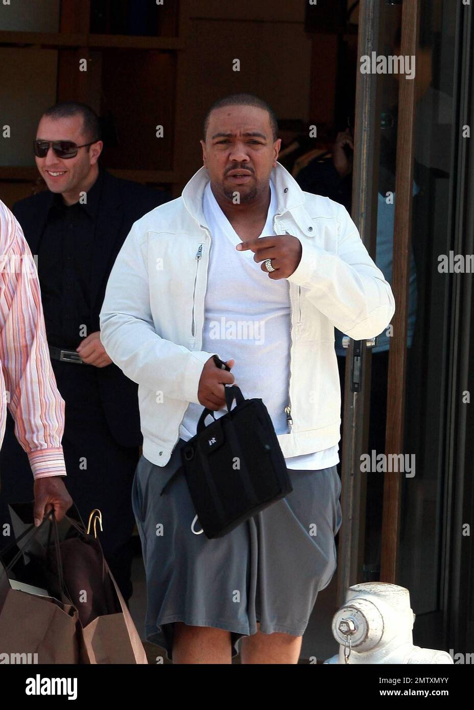 Rapper and producer Timbaland leaves the Louis Vuitton store after some ...