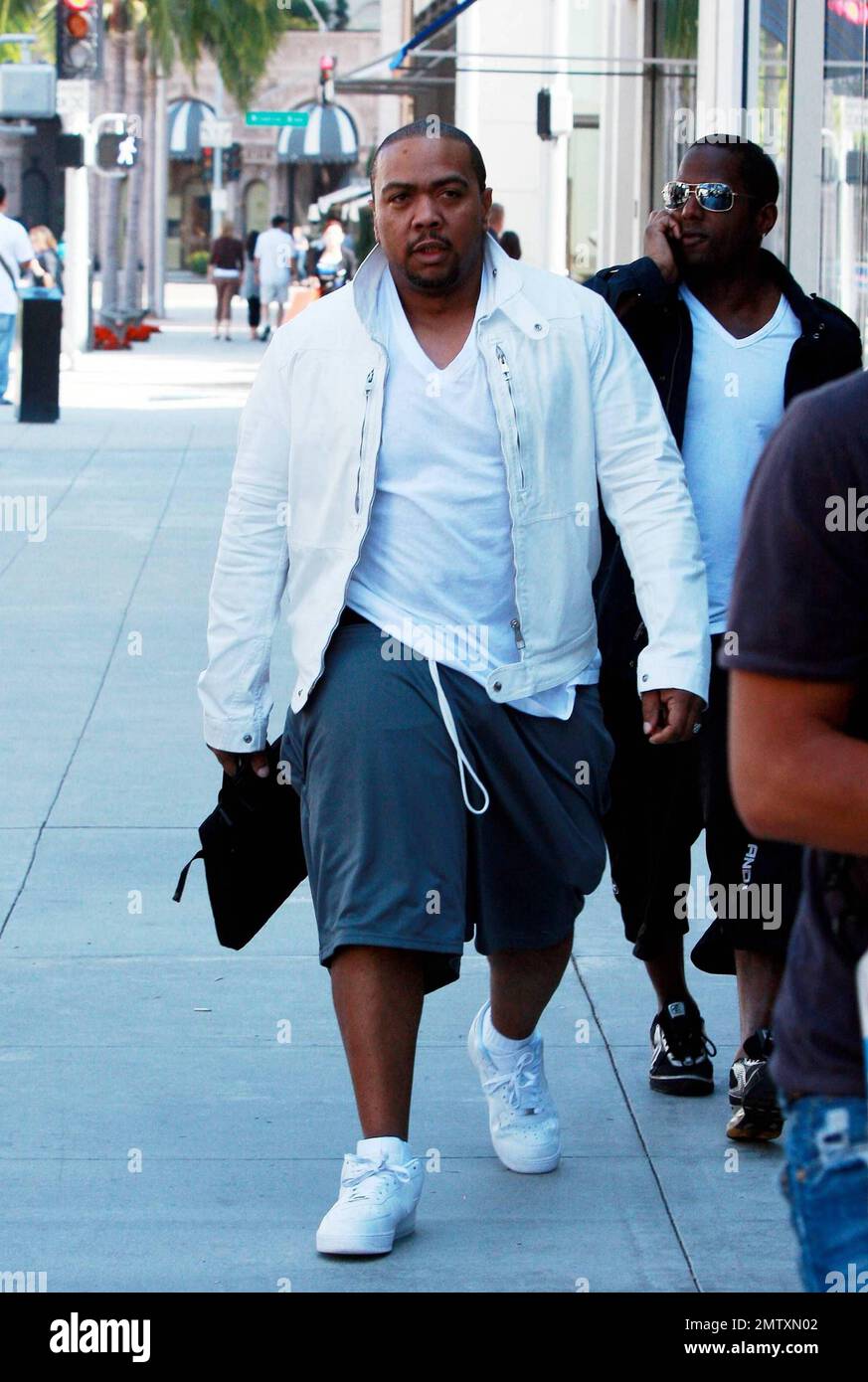 Rapper and producer Timbaland leaves the Louis Vuitton store after some ...