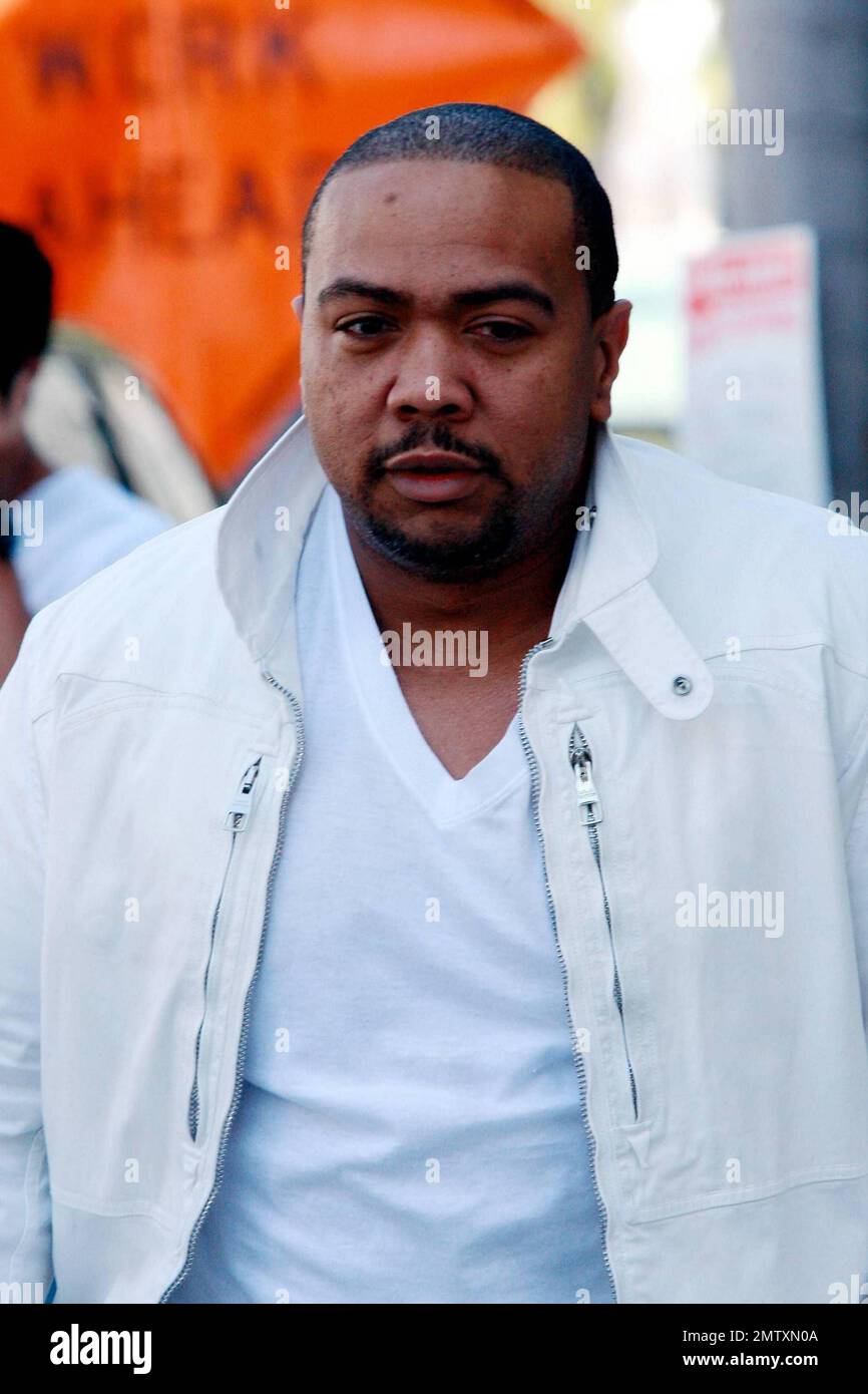 Rapper and producer Timbaland leaves the Louis Vuitton store after some ...