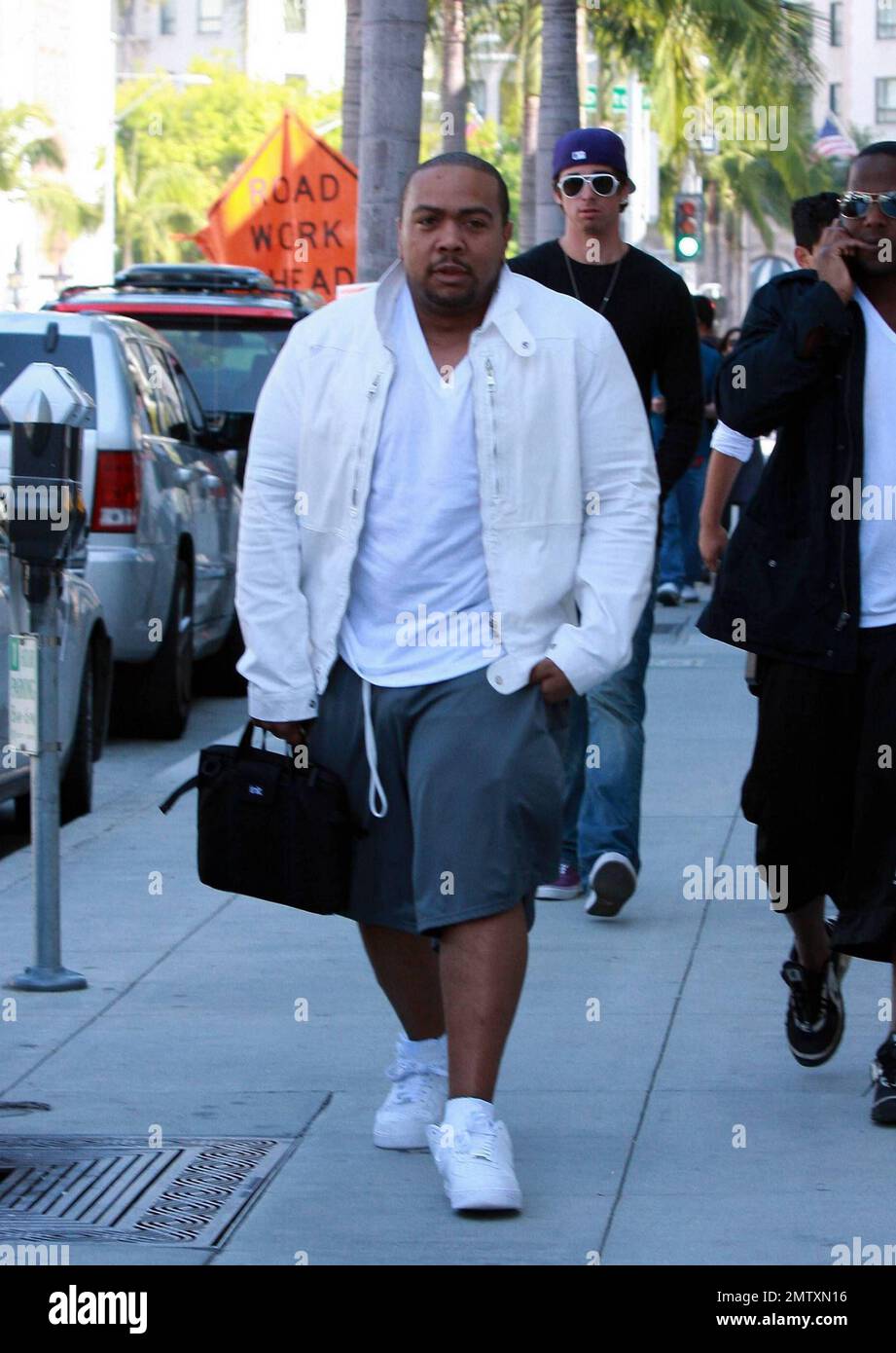 Rapper and producer Timbaland leaves the Louis Vuitton store after some ...