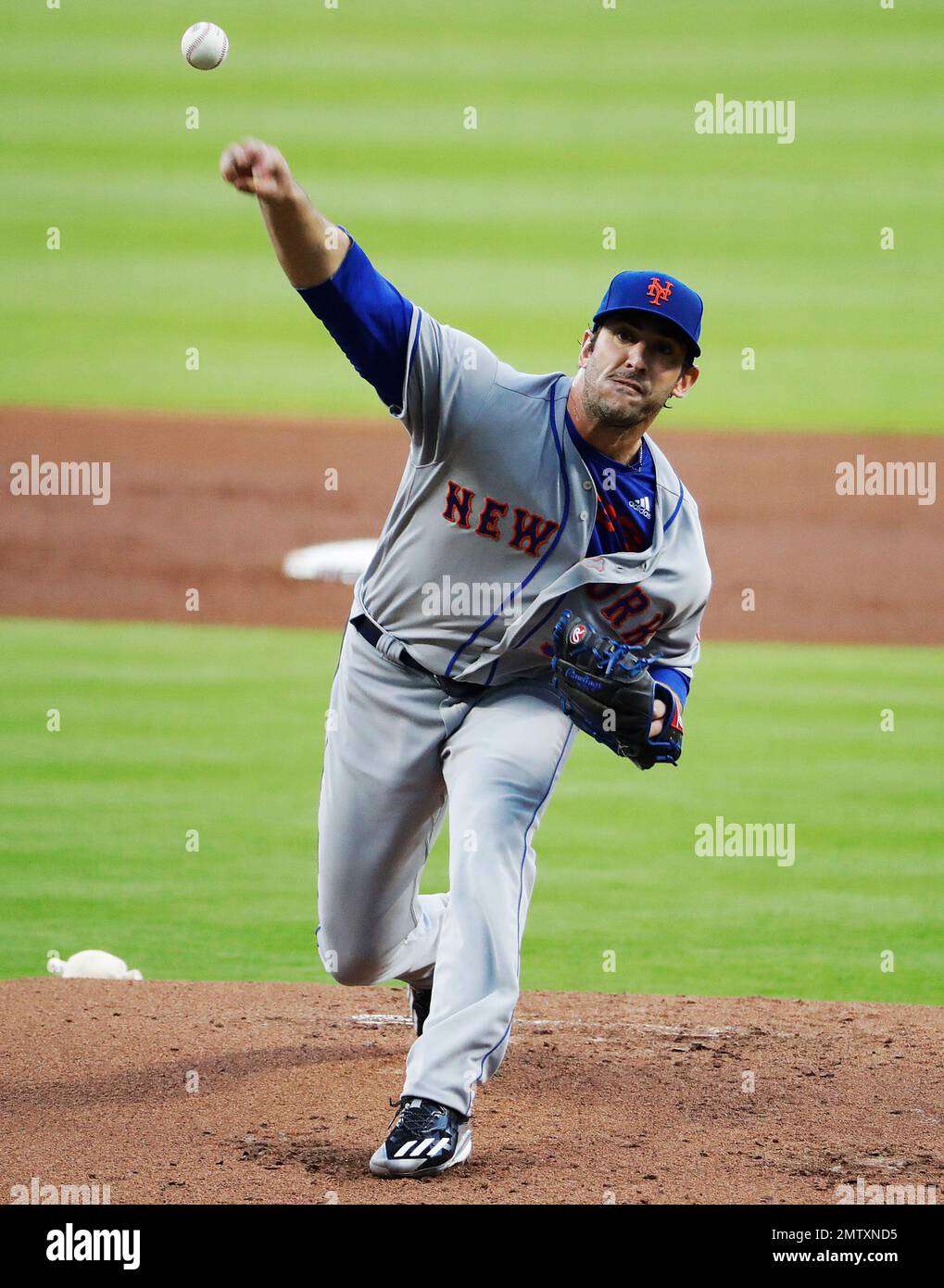 New York Mets starting pitcher Matt Harvey throws during the first ...