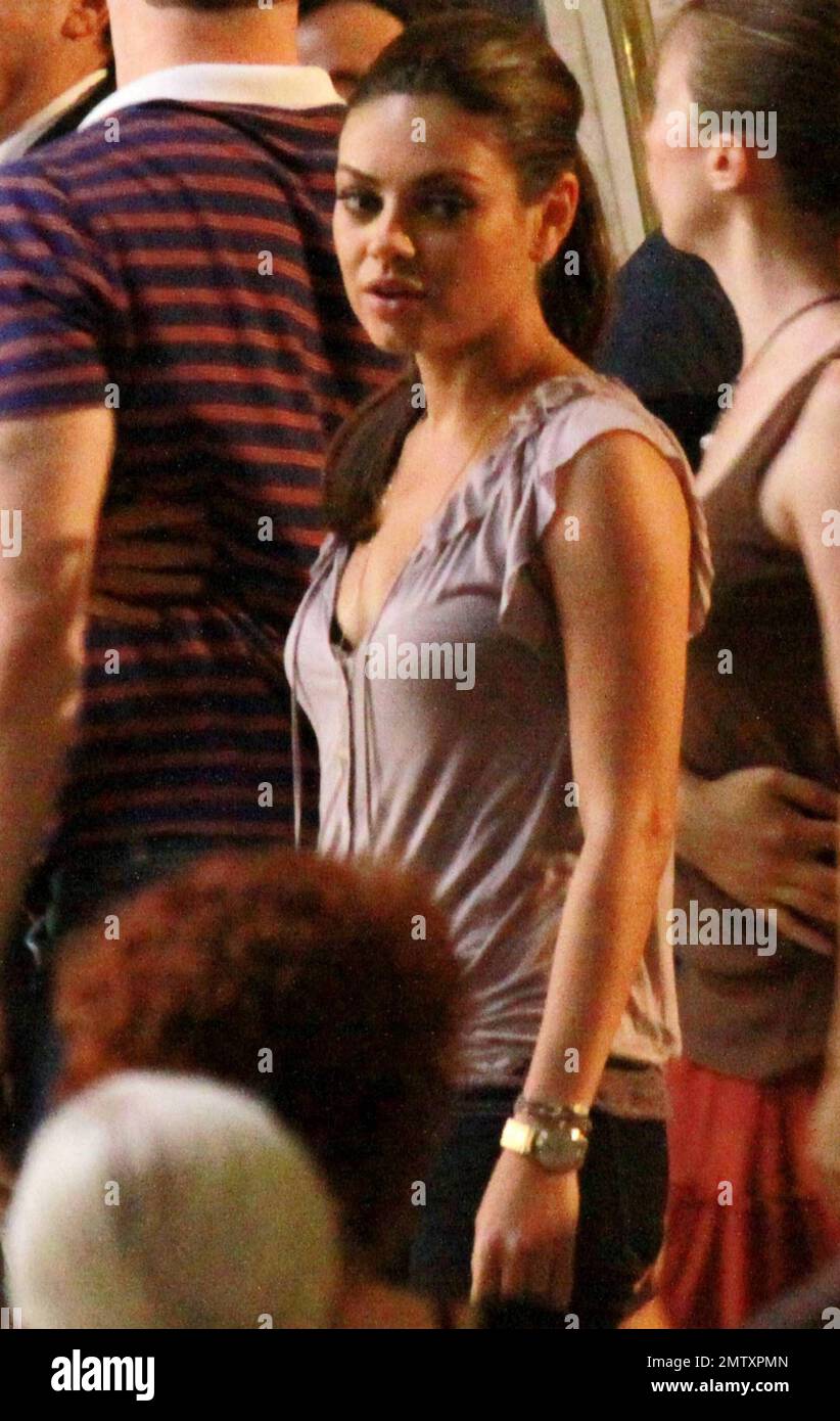 Justin Timberlake and Mila Kunis film scenes with a large dancing, arm ...