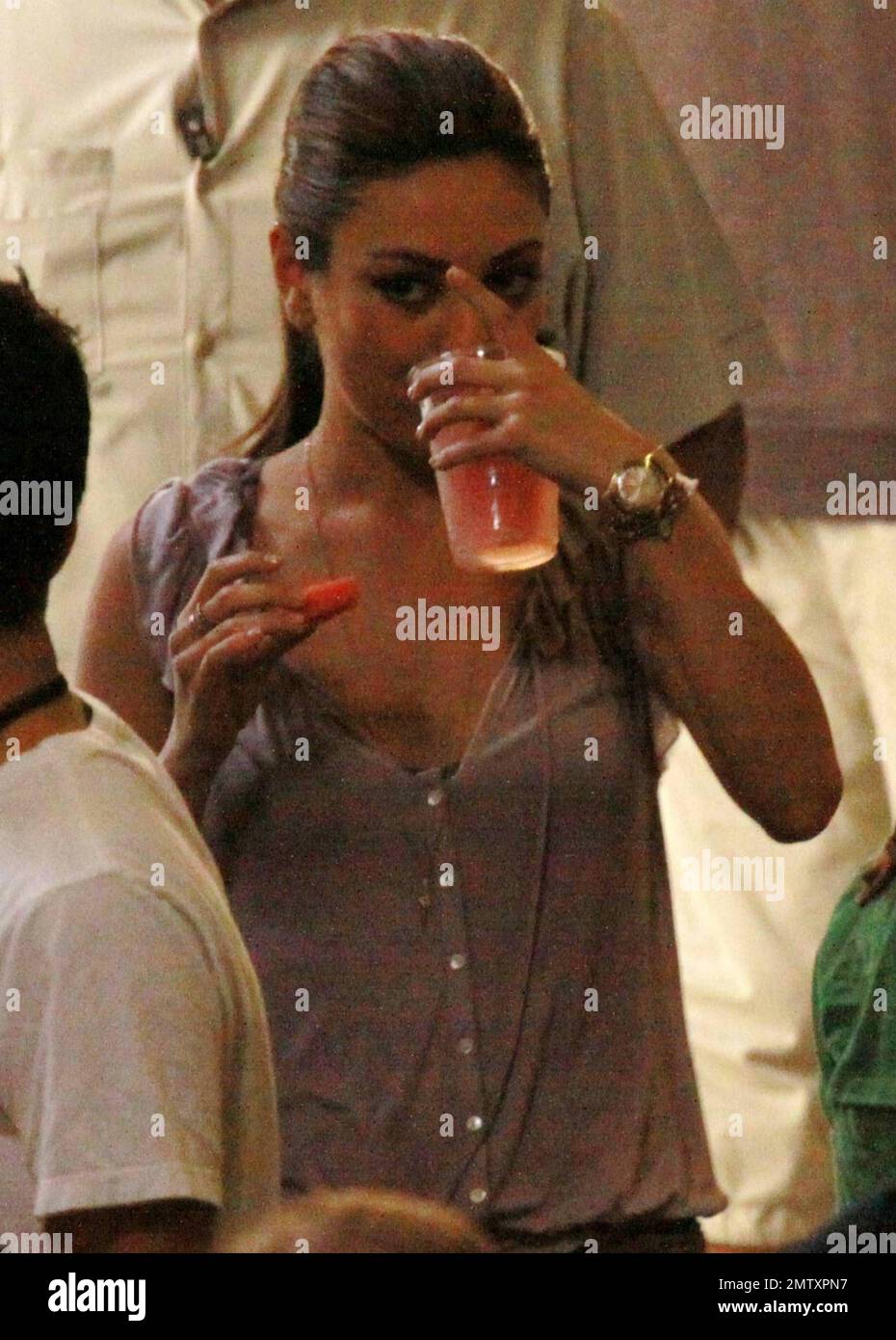 Justin Timberlake and Mila Kunis film scenes with a large dancing, arm ...