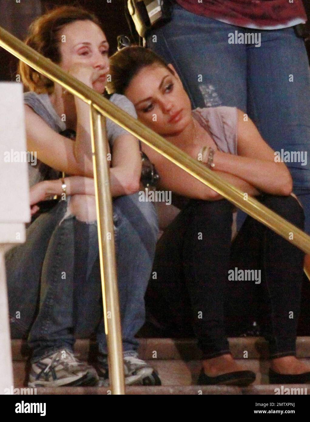 Justin Timberlake and Mila Kunis film scenes with a large dancing, arm ...