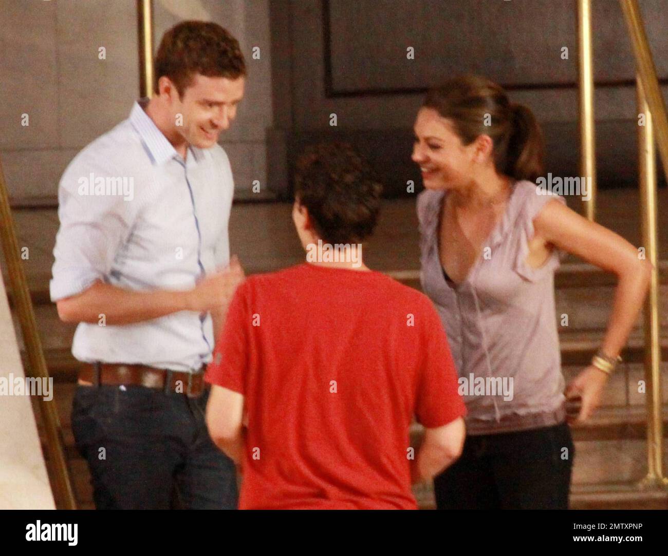 Justin Timberlake and Mila Kunis film scenes with a large dancing, arm ...