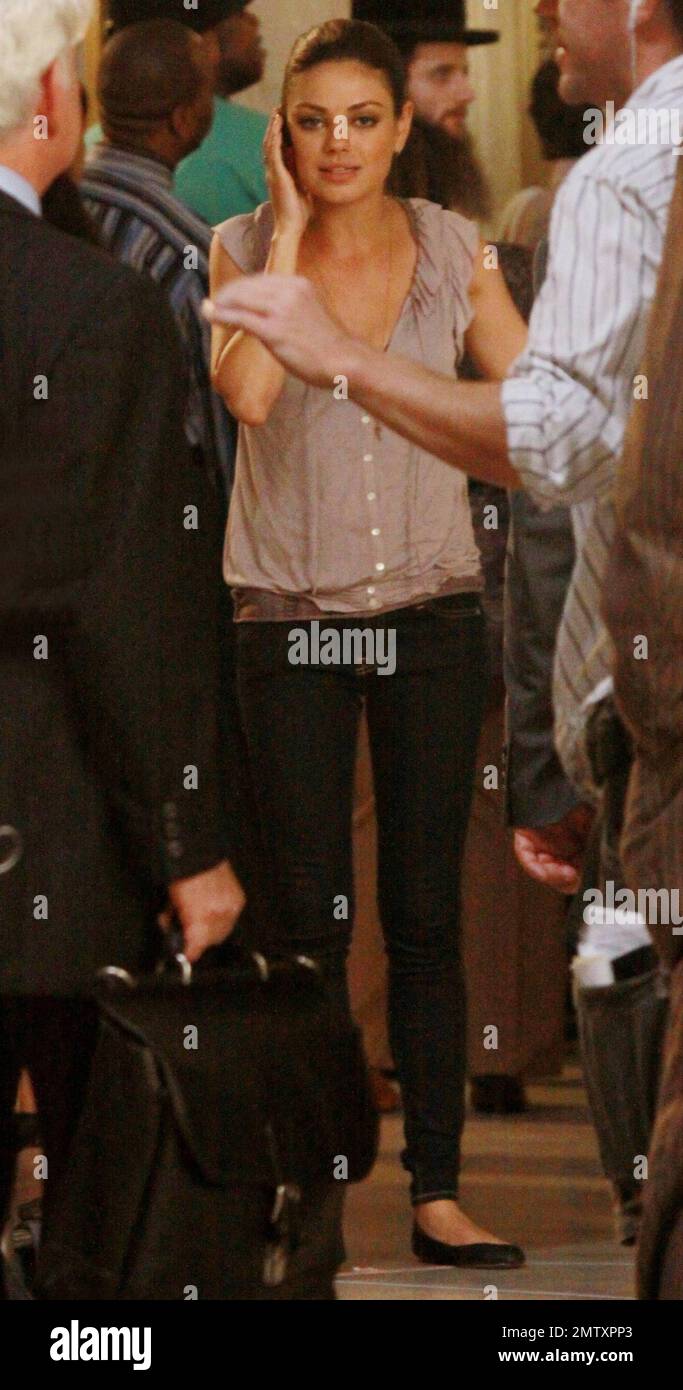 Justin Timberlake and Mila Kunis film scenes with a large dancing, arm ...