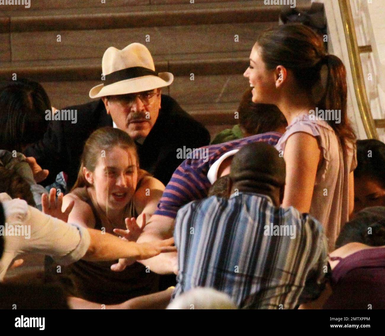 Justin Timberlake and Mila Kunis film scenes with a large dancing, arm ...