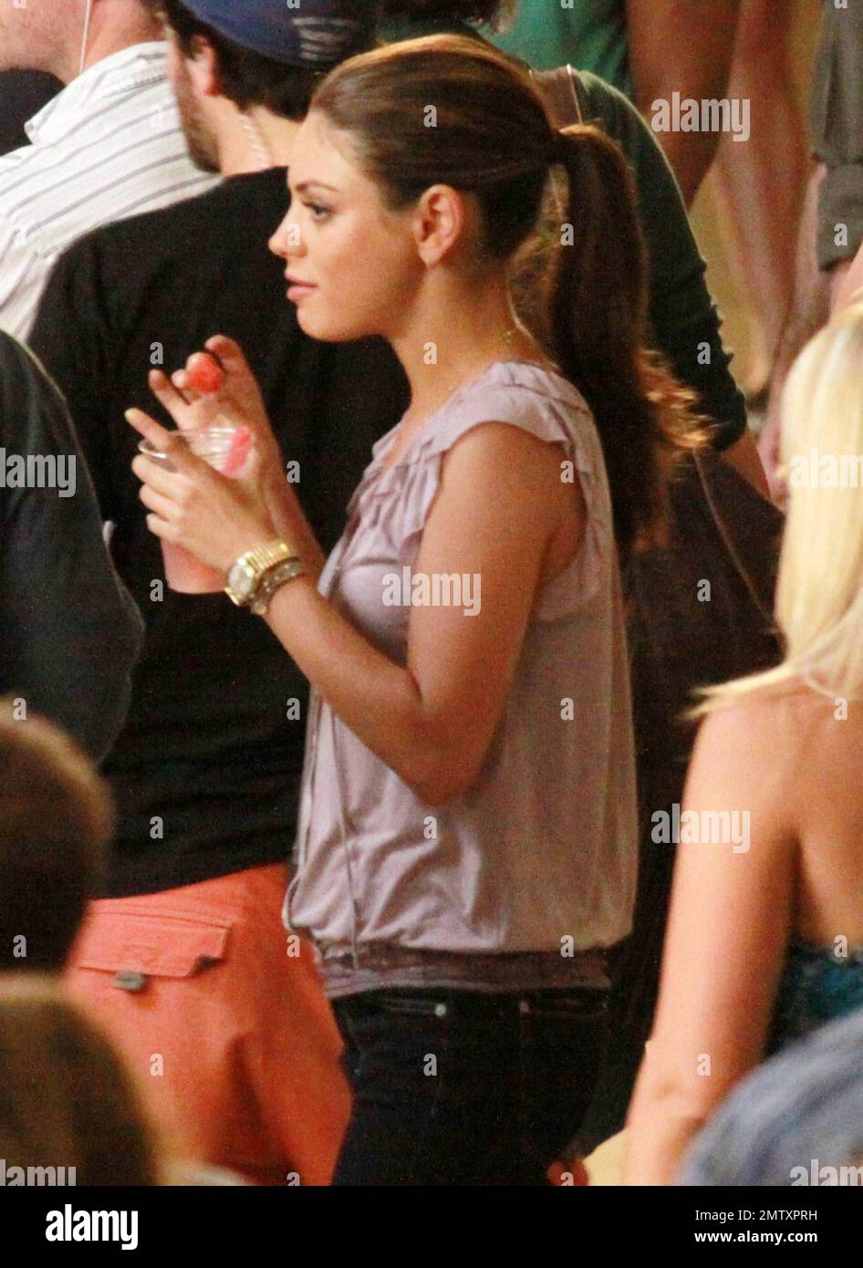 Justin Timberlake and Mila Kunis film scenes with a large dancing, arm ...