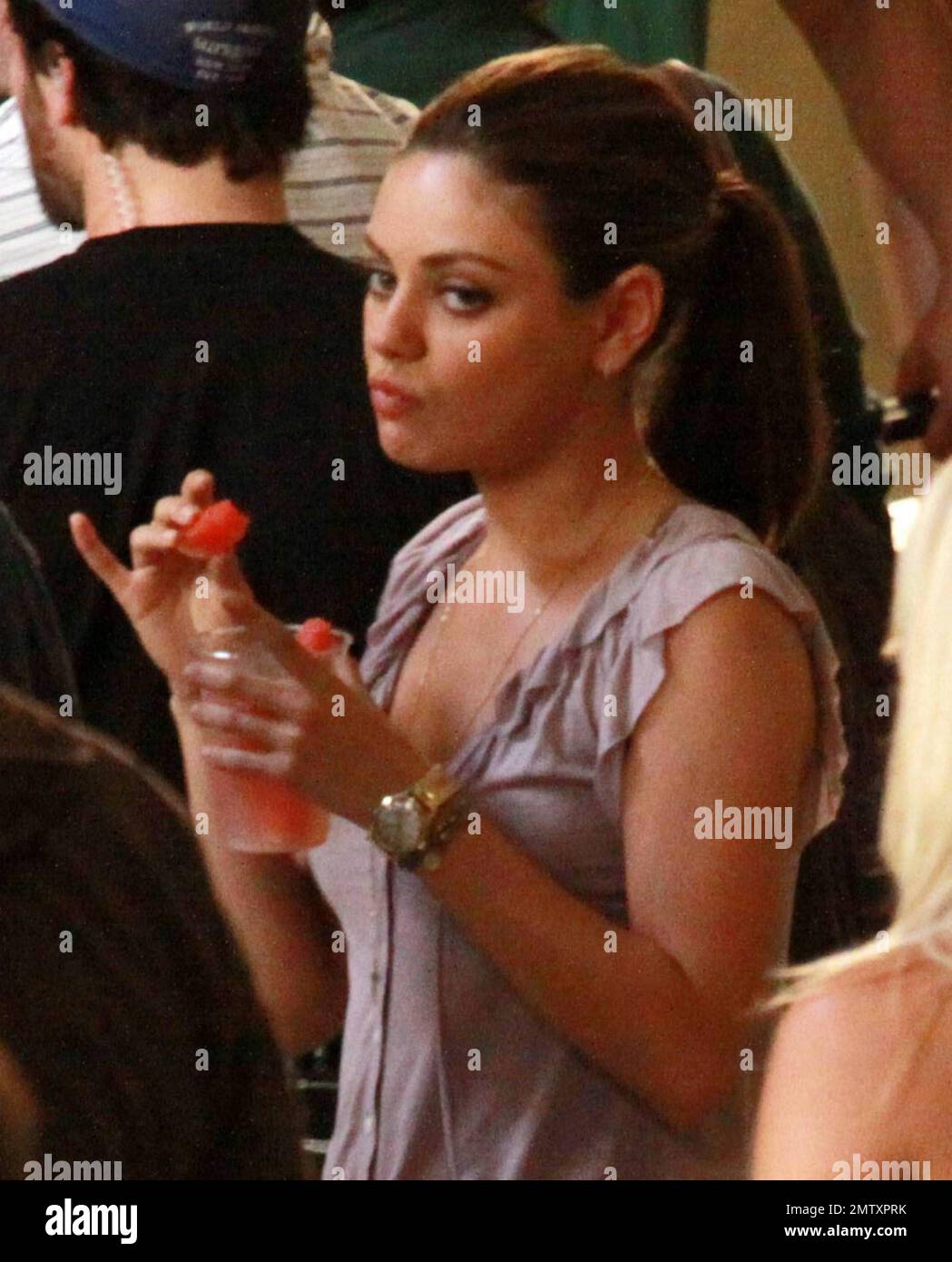 Justin Timberlake and Mila Kunis film scenes with a large dancing, arm ...