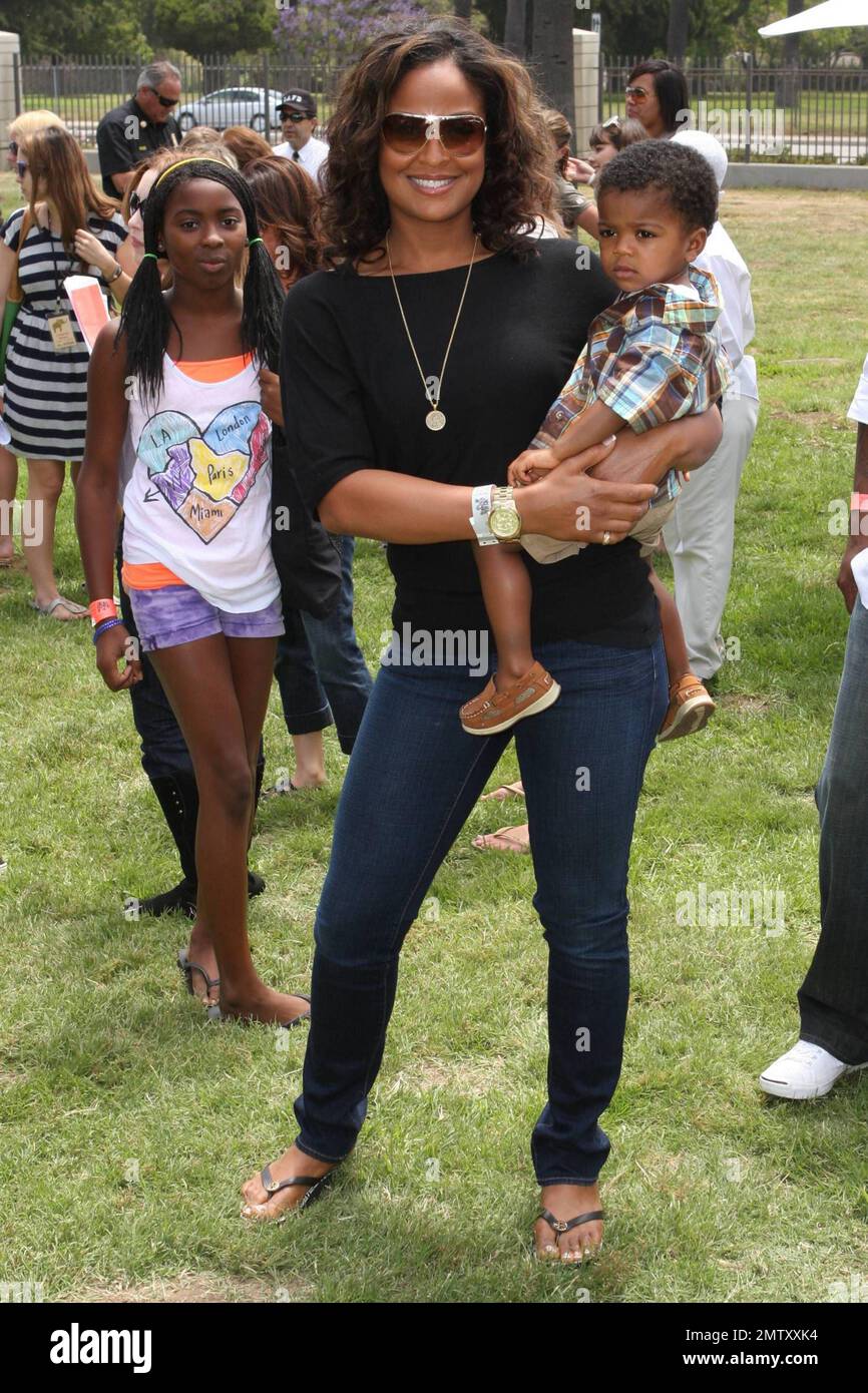 Laila Ali, daughter of Muhammad Ali, arrives with son Curtis to ...
