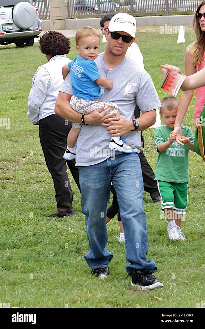 Mark Wahlberg, wife Rhea Durham and sons Brendan and Michael arrive to ...