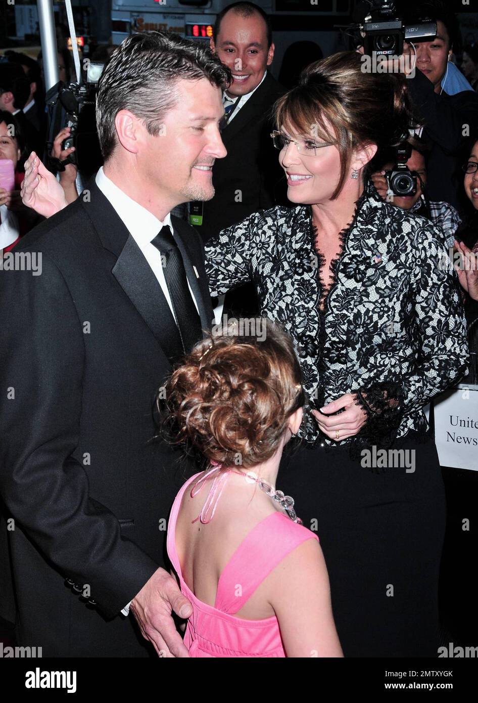 Sarah Palin, husband Todd and daughter Piper walk the red carpet at ...