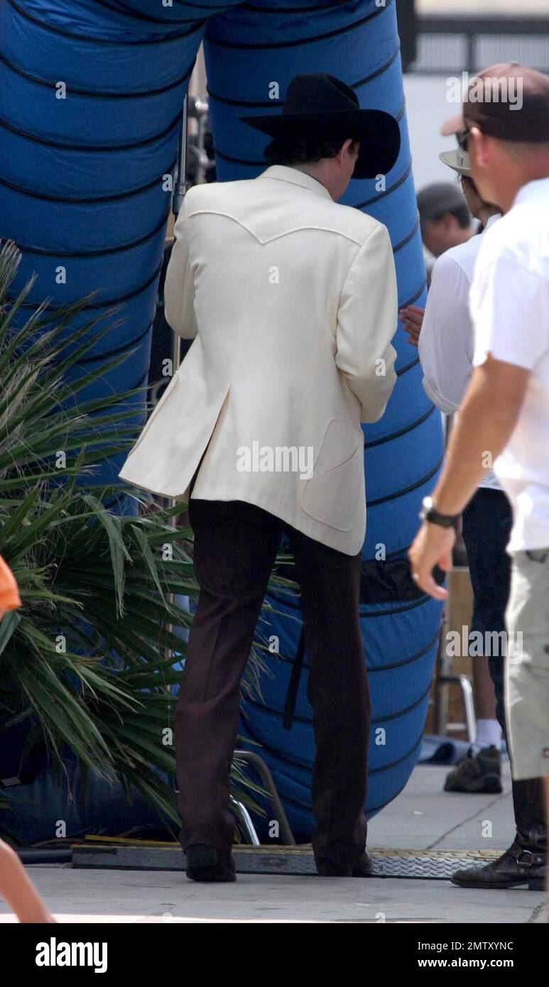 Exclusive!! Timothy Hutton, wearing a white blazer and black cowboy hat ...