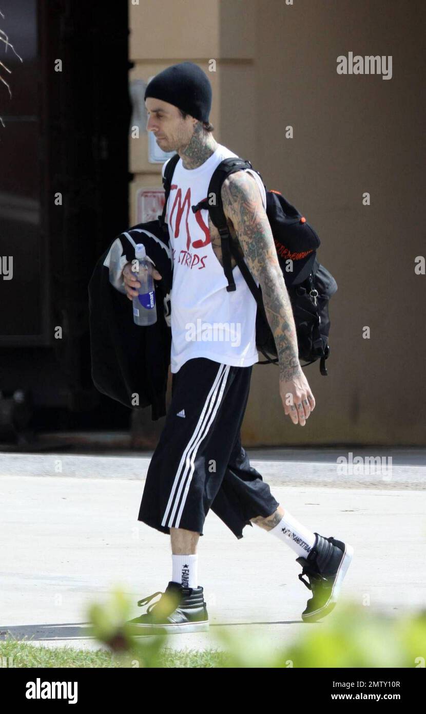 EXCLUSIVE!! A tired looking Travis Barker leaves his Florida hotel for ...