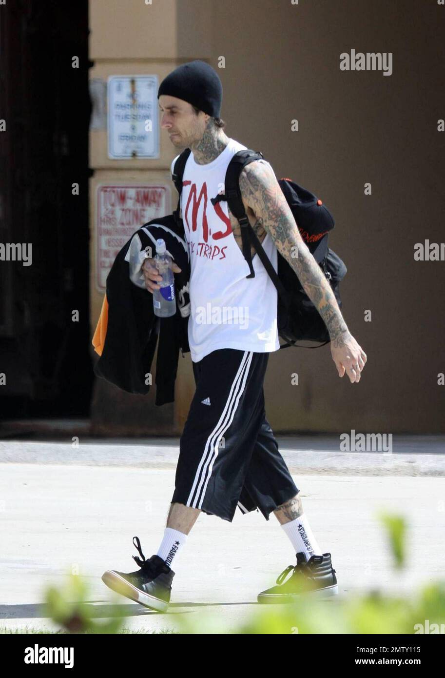 EXCLUSIVE!! A tired looking Travis Barker leaves his Florida hotel for ...