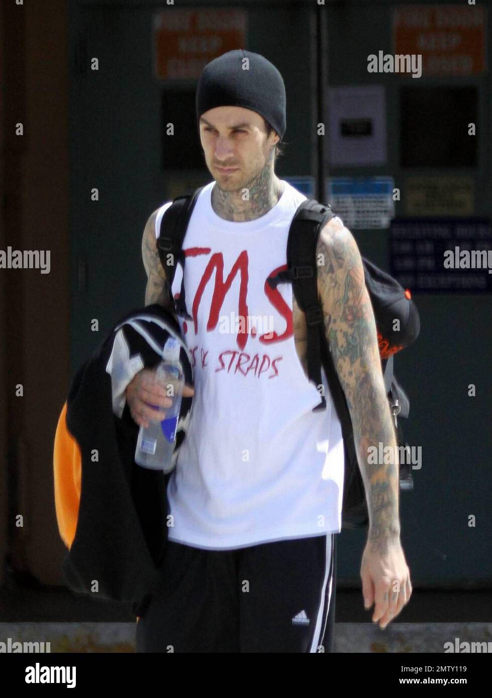 EXCLUSIVE!! A tired looking Travis Barker leaves his Florida hotel for ...