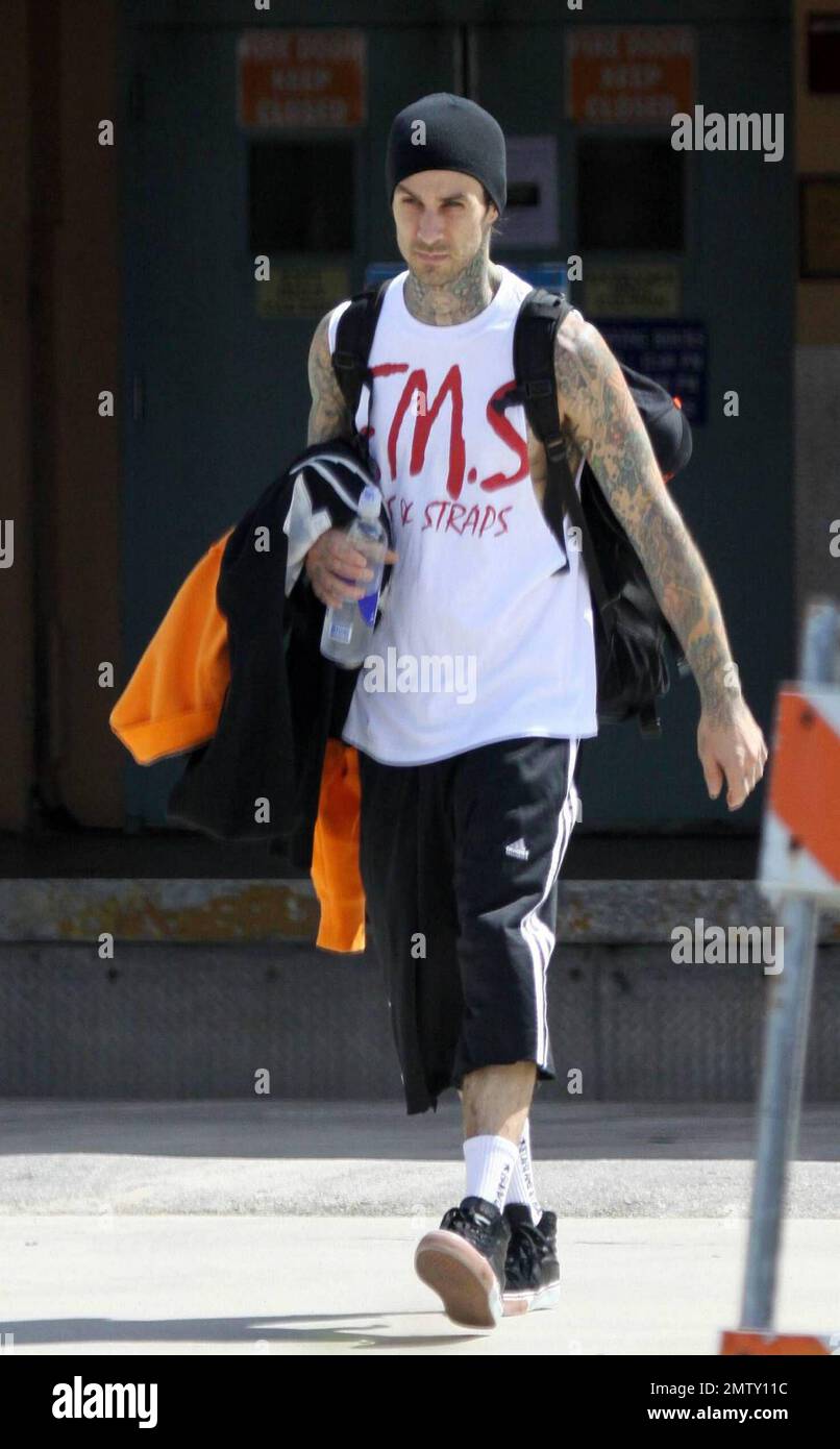 EXCLUSIVE!! A tired looking Travis Barker leaves his Florida hotel for ...