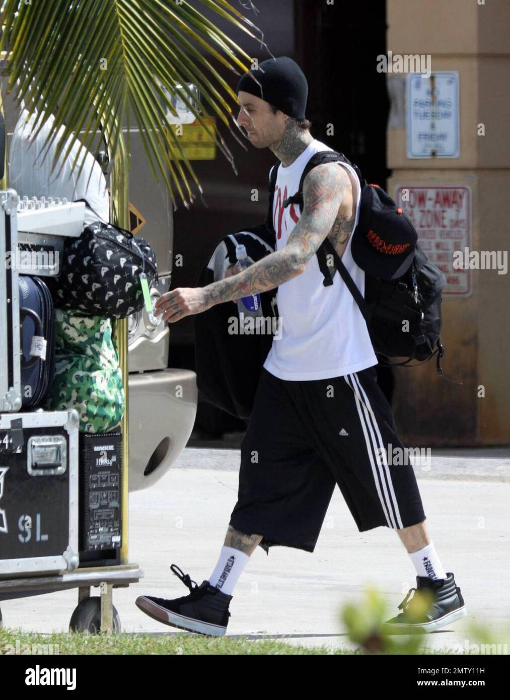 EXCLUSIVE!! A tired looking Travis Barker leaves his Florida hotel for ...
