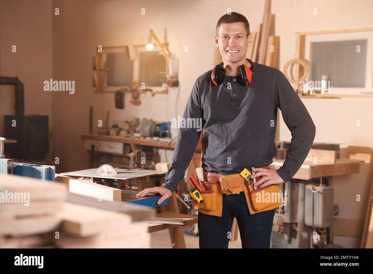 Professional carpenter with set of tools in workshop Stock Photo - Alamy
