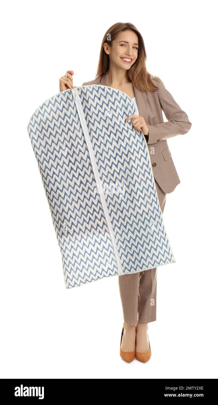 Young woman holding garment cover with clothes on white background. Dry ...