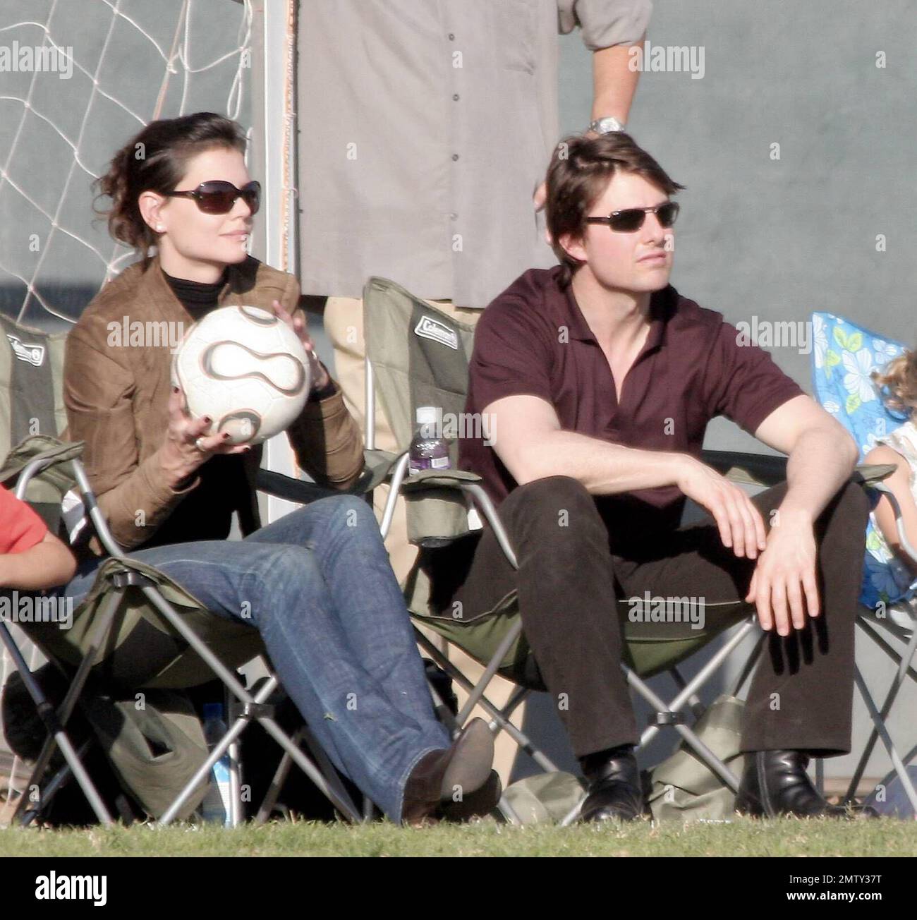 Tom and Katie spend a day at the ball park with Tom's adopted children ...