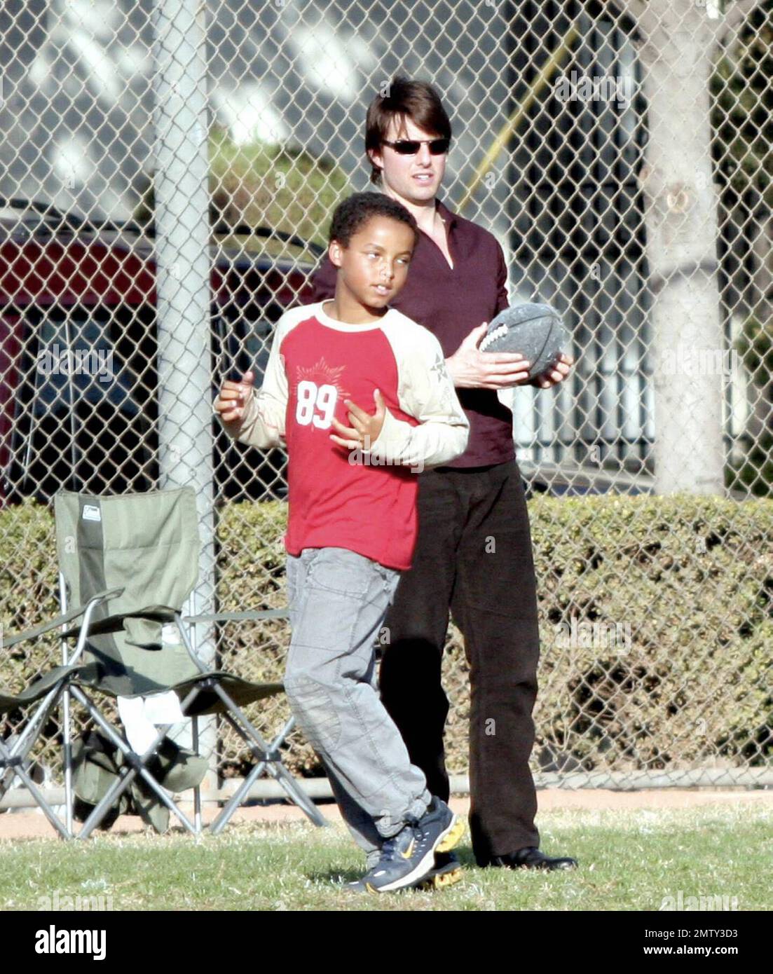 Tom and Katie spend a day at the ball park with Tom's adopted children ...