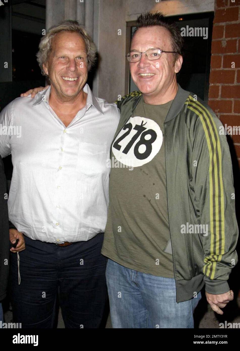 Tom Arnold quickly pulls up a seat with Steve Tisch and his family at ...
