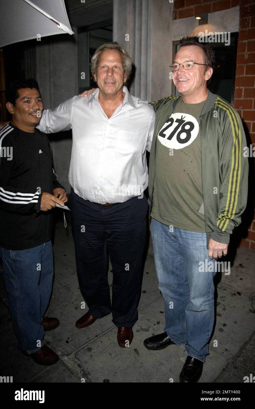 Tom Arnold quickly pulls up a seat with Steve Tisch and his family at ...