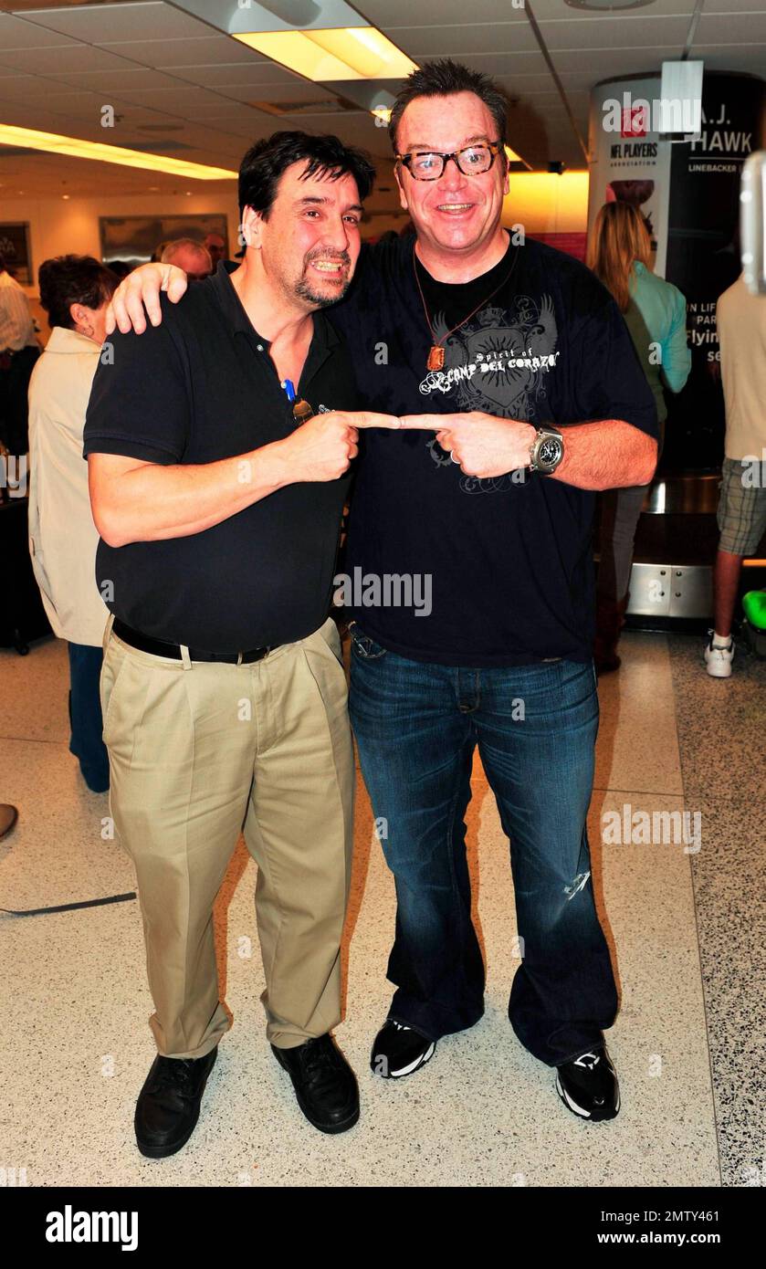 Actor Tom Arnold grabs some lunch after he arrives at Miami ...