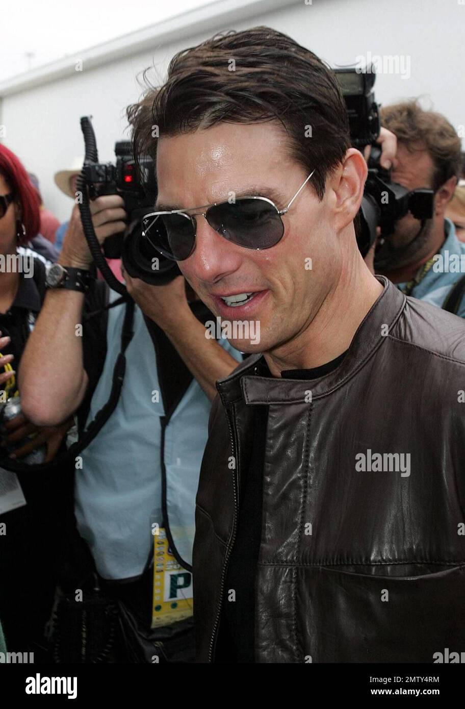 Actor Tom Cruise walks to the drivers meeting at Daytona International ...