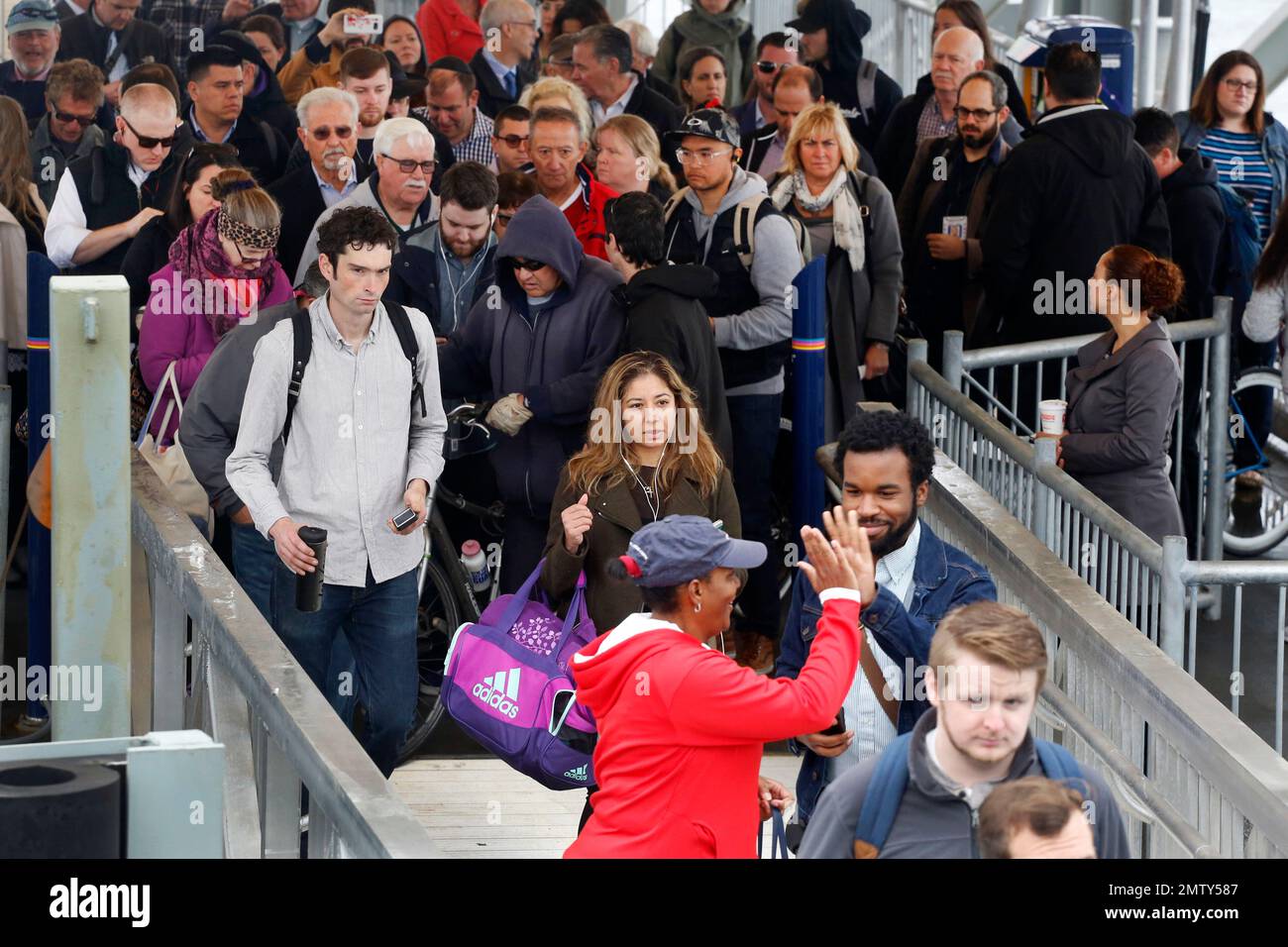 Gemma Mozeak high-fives her son, Alex, as they board a NYC Ferry in the ...